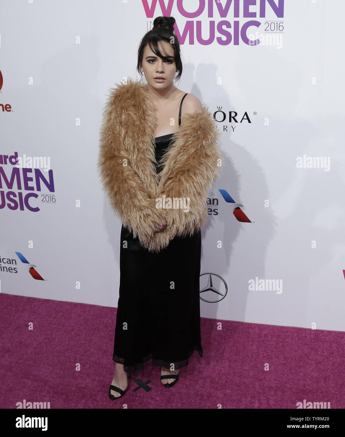 Bea Miller arrives on the red carpet at the Billboard Women in Music ...