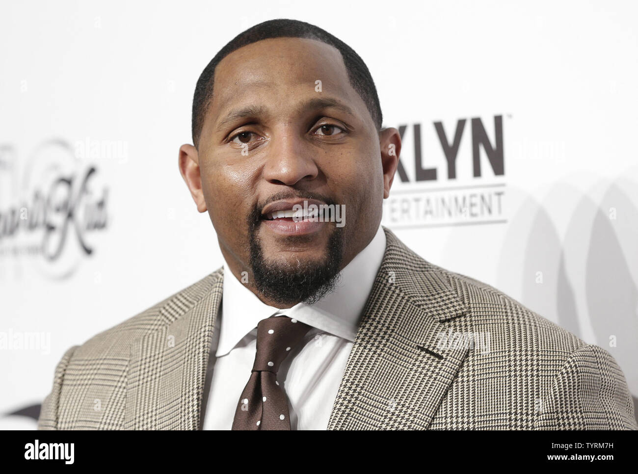 Ray Lewis arrives on the red carpet at the Sports Illustrated ...
