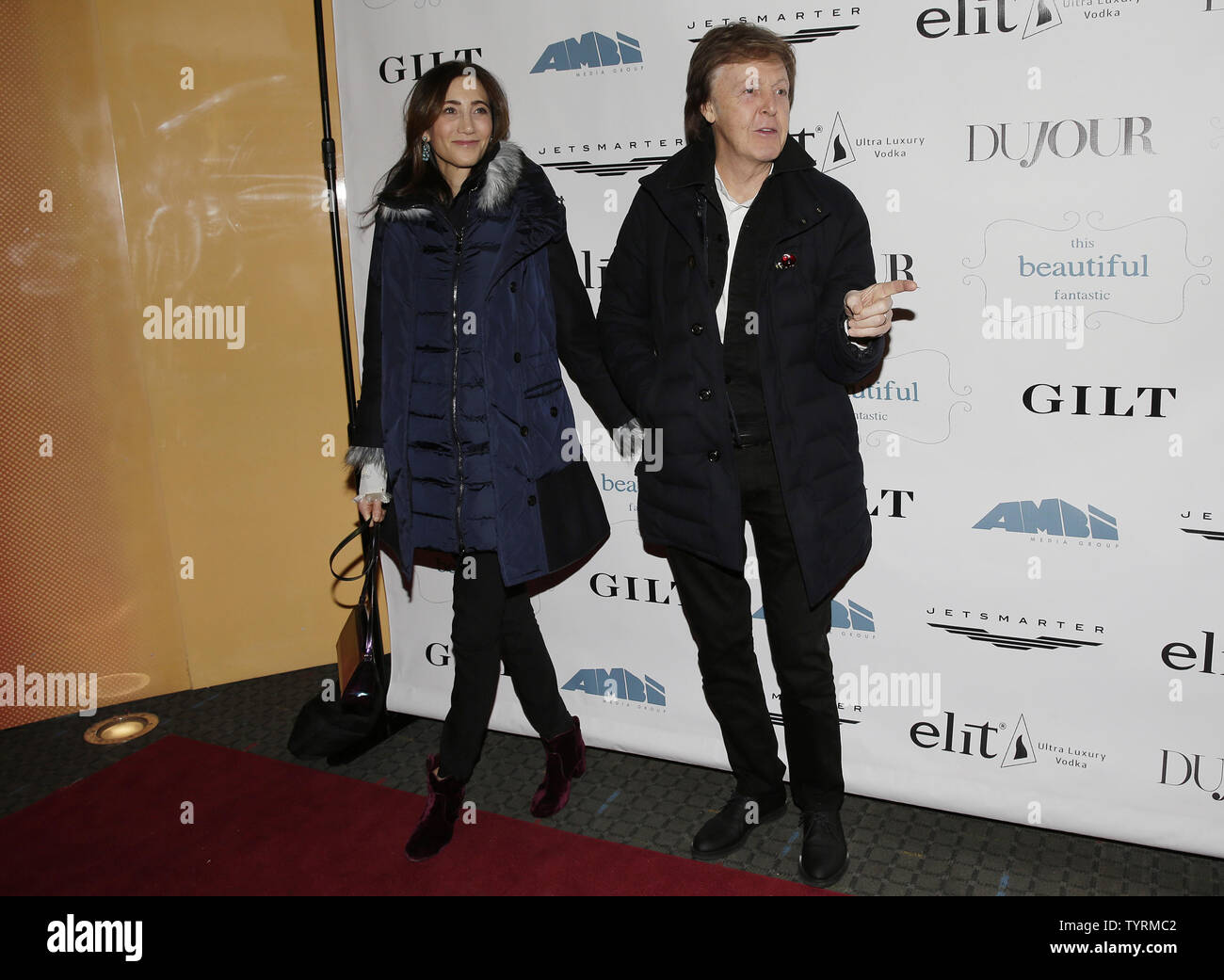 Nancy Shevell and Sir Paul McCartney arrive on the red carpet at a ...