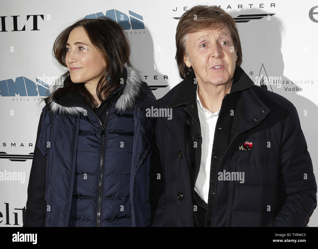 Nancy Shevell and Sir Paul McCartney arrive on the red carpet at a ...