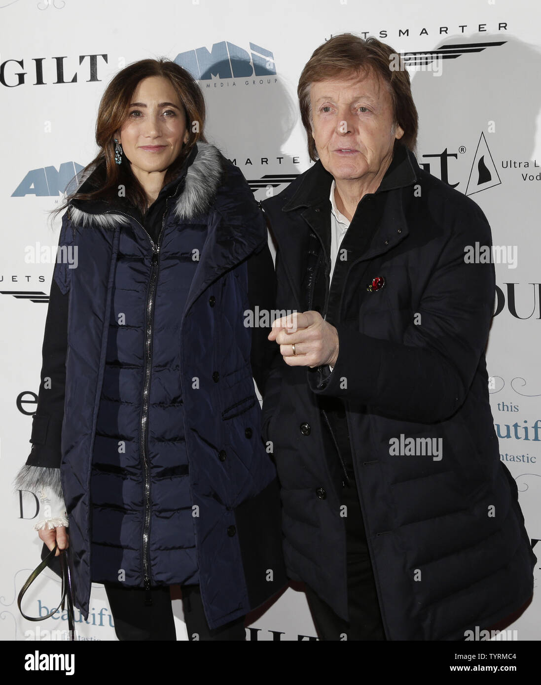 Nancy Shevell and Sir Paul McCartney arrive on the red carpet at a ...