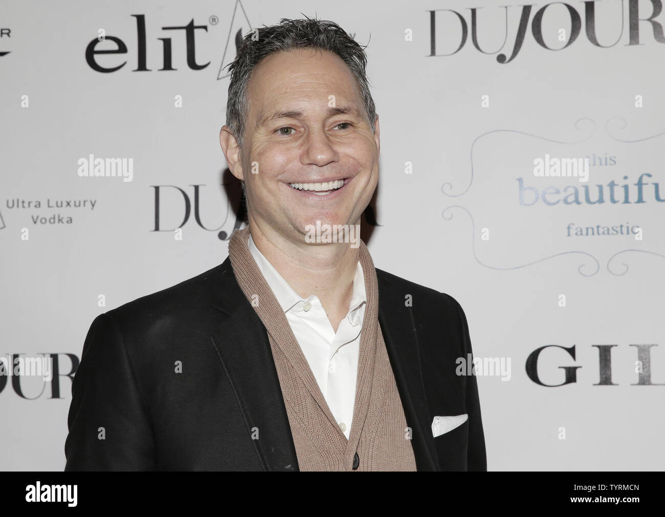Jason Binn arrives on the red carpet at a screening of "This Beautiful ...