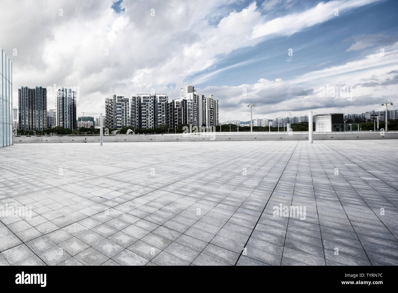 Modern square and skyscrapers Stock Photo - Alamy