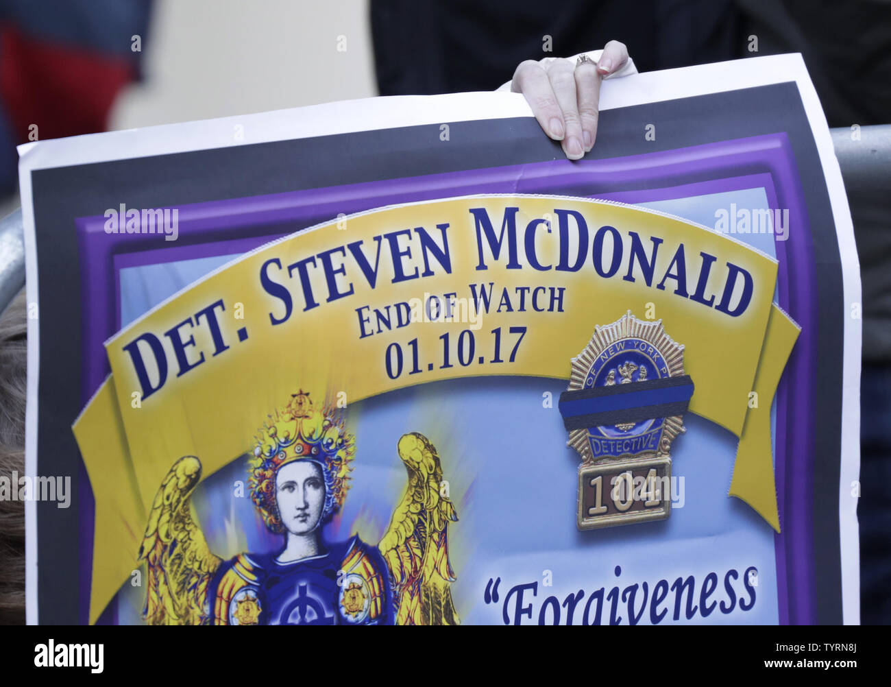 Mourners stand outside at the funeral of Hero NYPD Detective Steven ...