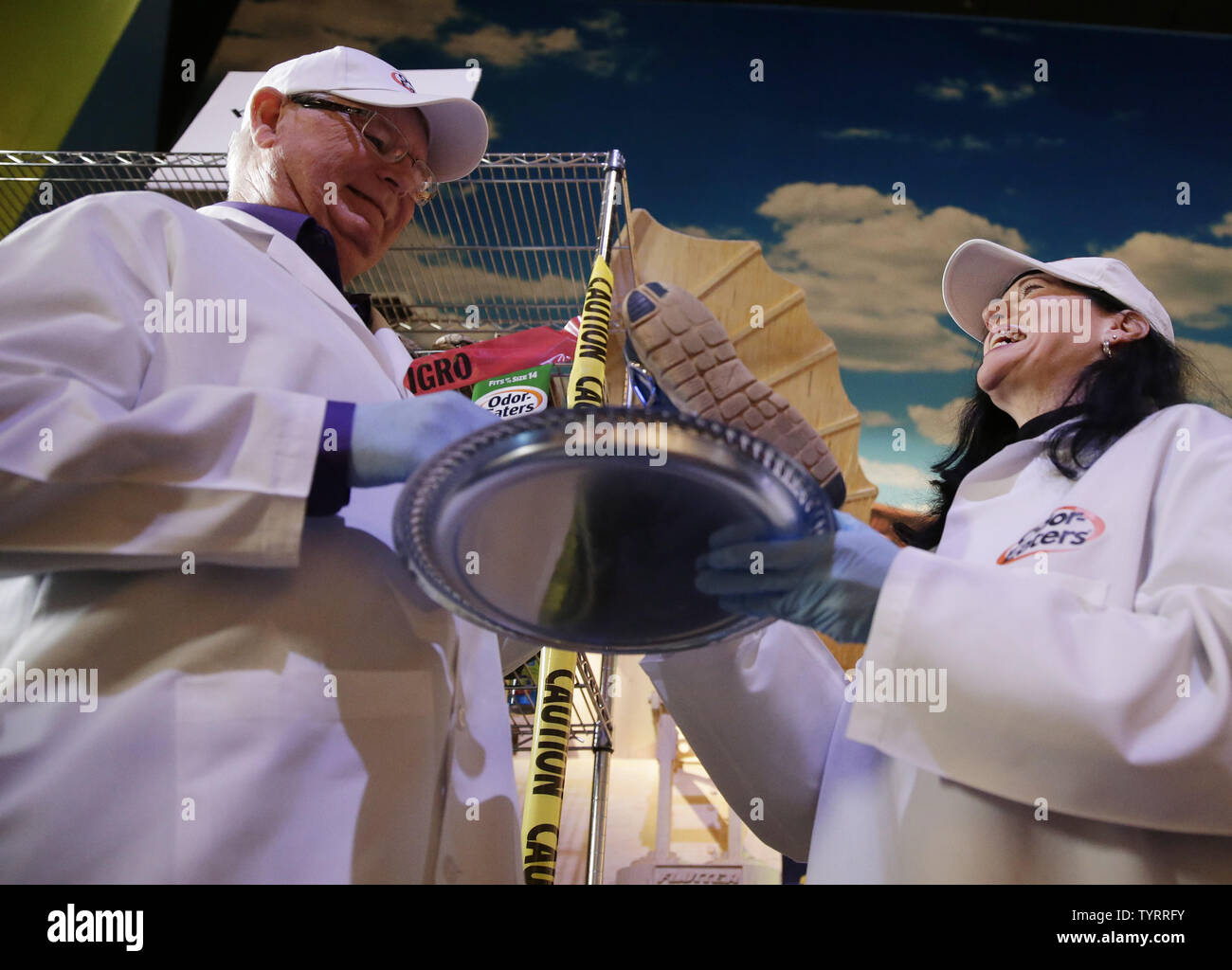 Judges examine a sneaker entry at the 42nd annual National Odor-Eaters ...