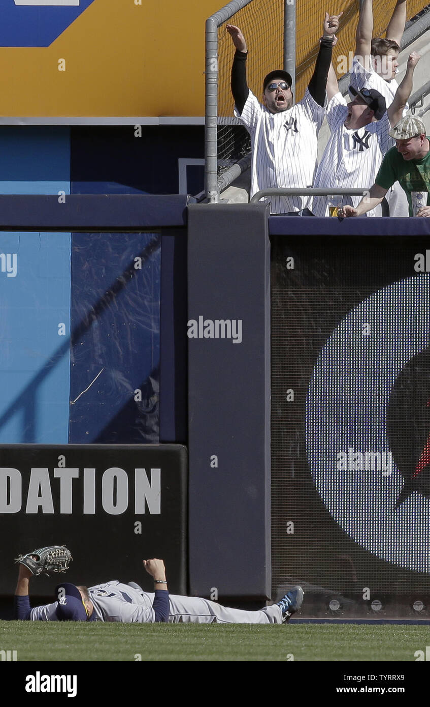 Fans react after Tampa Bay Rays right fielder Steven Souza Jr. (lying ...