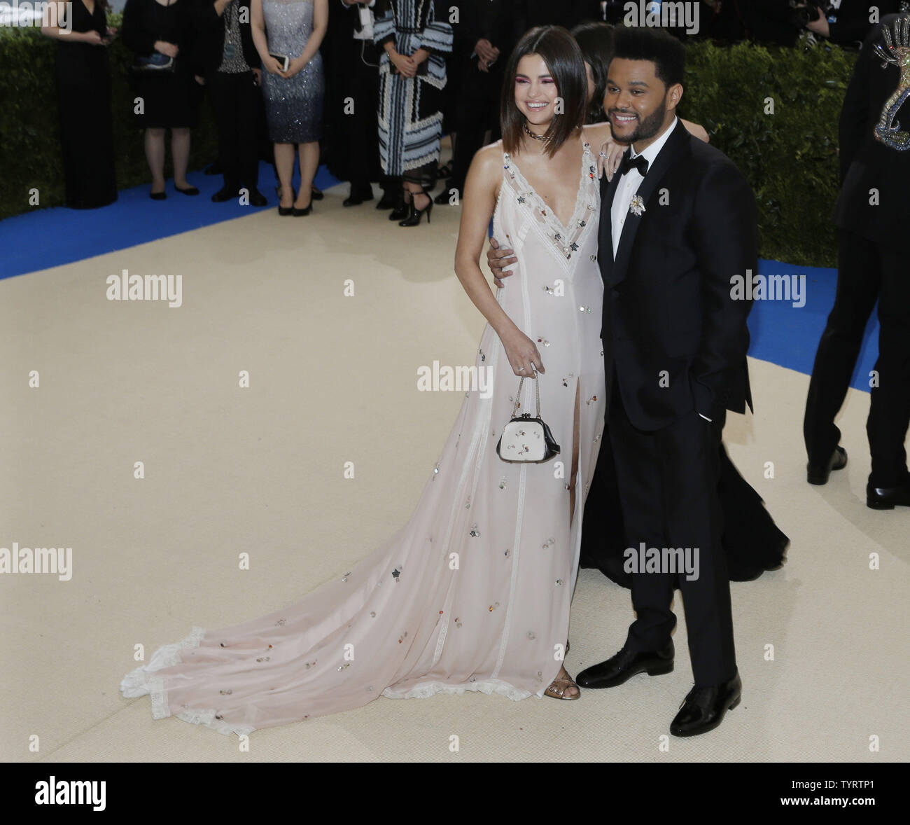 Selena Gomez and The Weeknd arrive on the red carpet at the Costume ...