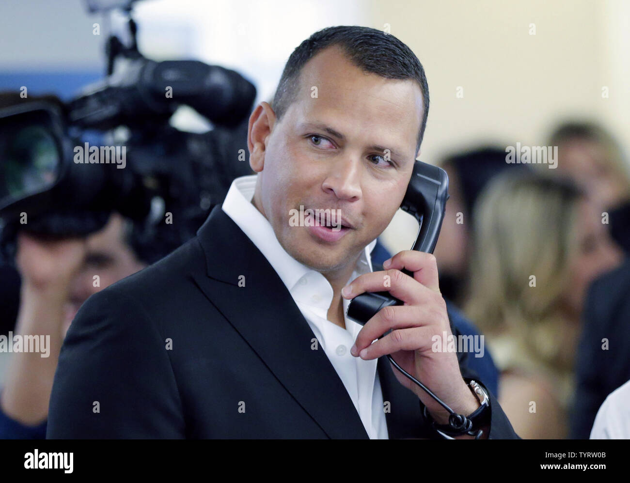 Alex Rodriguez speaks to a client at the 2017 BTIG Commissions for ...