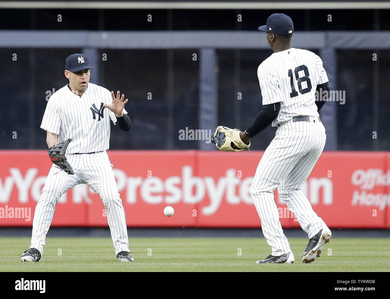 New York Yankees Didi Gregorius and Jacoby Ellsbury watch a ball drop ...