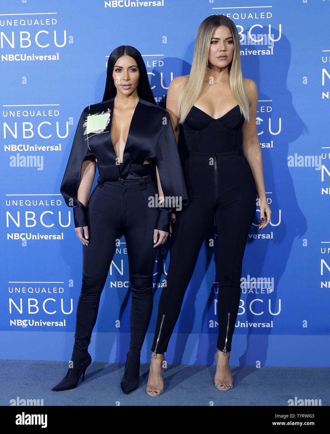 Kim Kardashian West and Khloe Kardashian arrive on the red carpet at ...