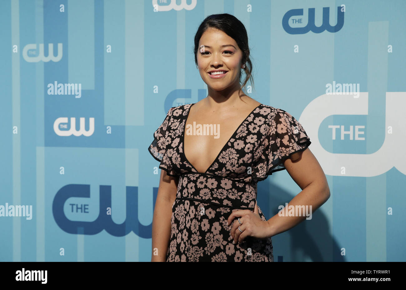 Gina Rodriguez arrives on the red carpet at the 2017 CW Upfront at the ...