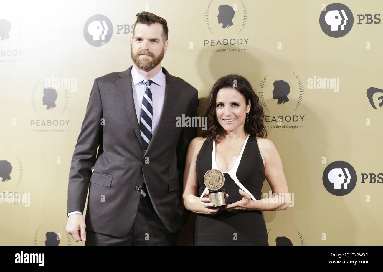 Timothy Simons and Julia Louis-Dreyfus arrive in the press room with an ...
