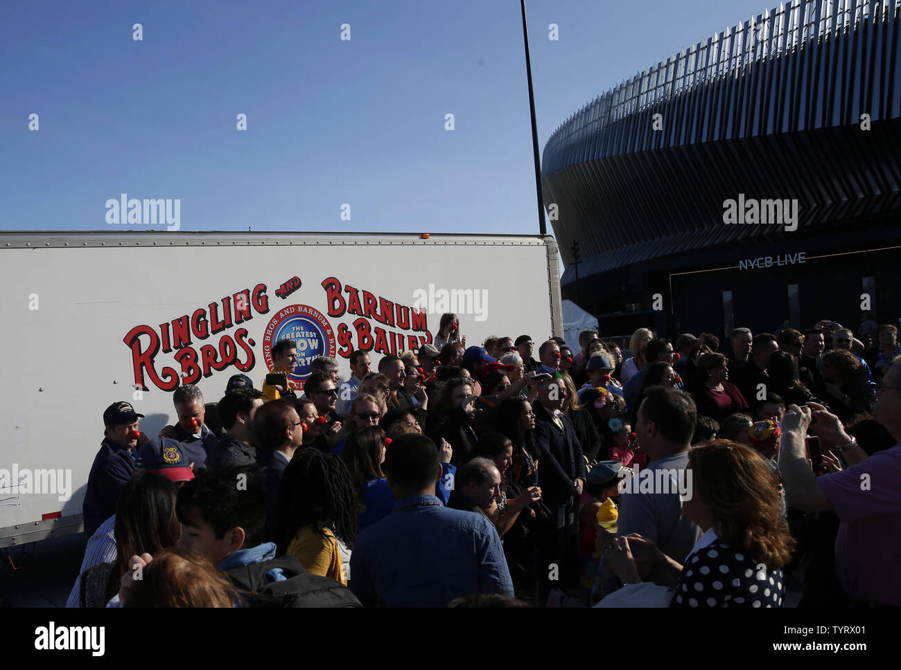 People take photos near a circus trailer on the final day of ...