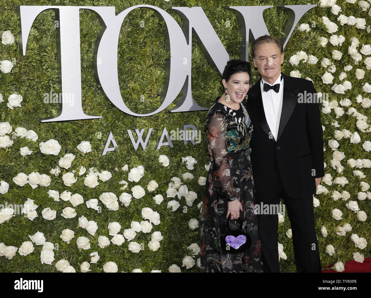 Phoebe Cates and Kevin Kline arrive on the red carpet at the 71st ...