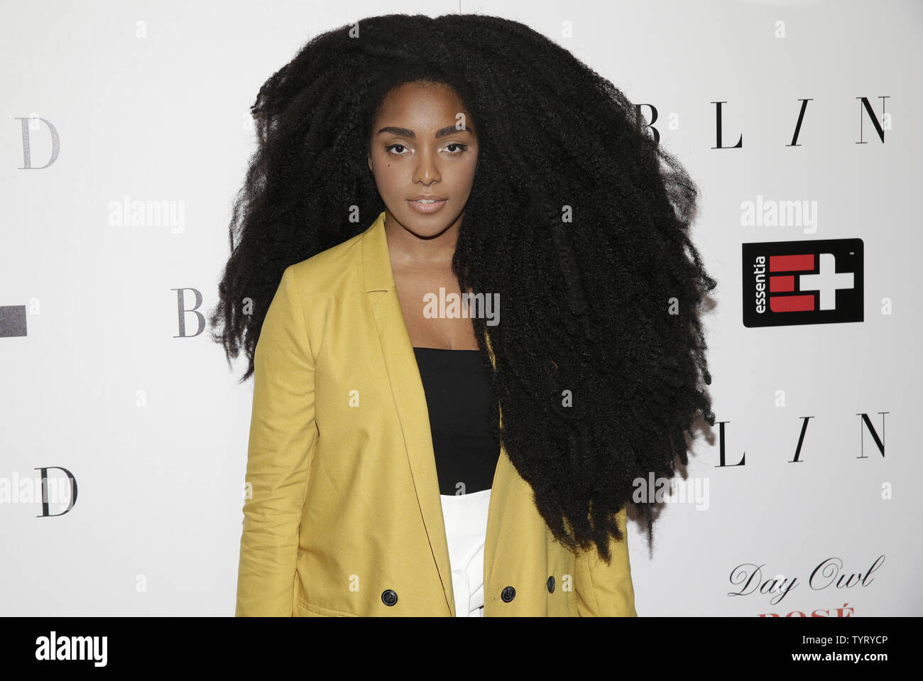 TK Quann arrives on the red carpet at the 'Blind' premiere at Landmark ...