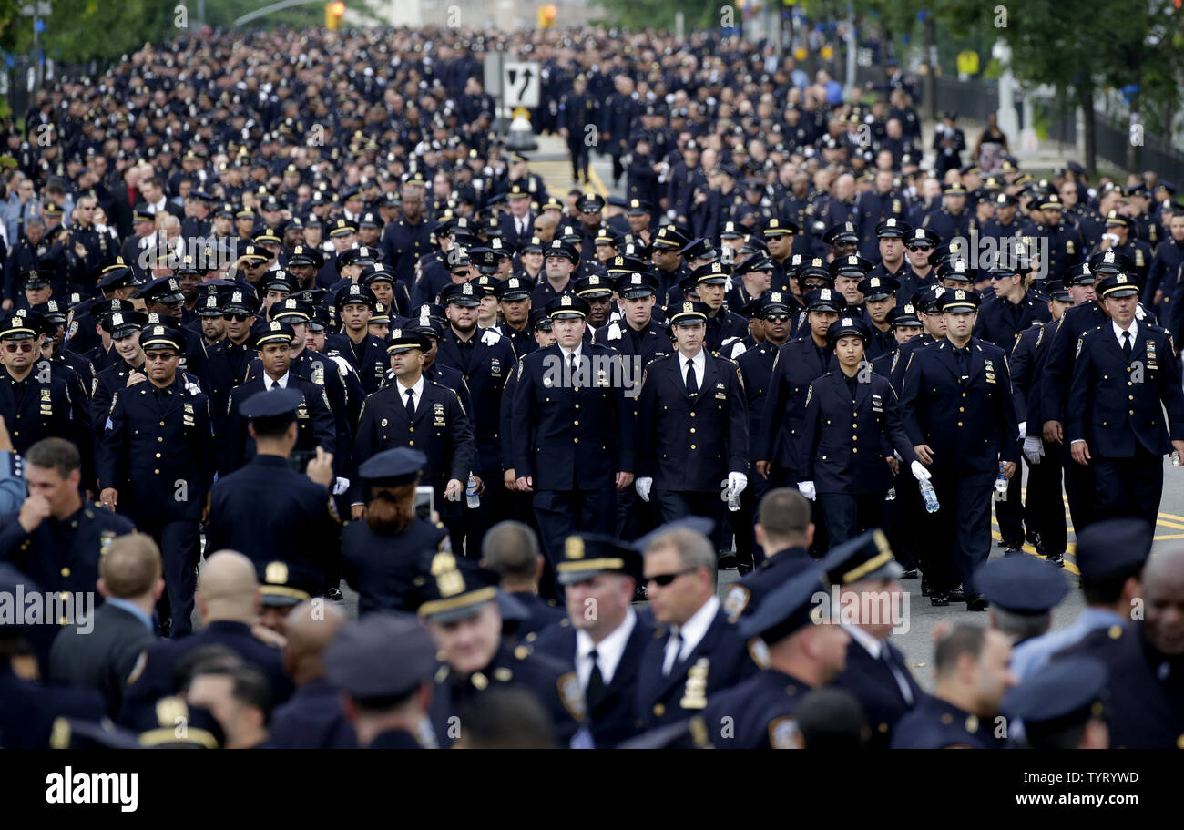 NYPD police officers arrive at the funeral of NYPD officer Miosotis ...