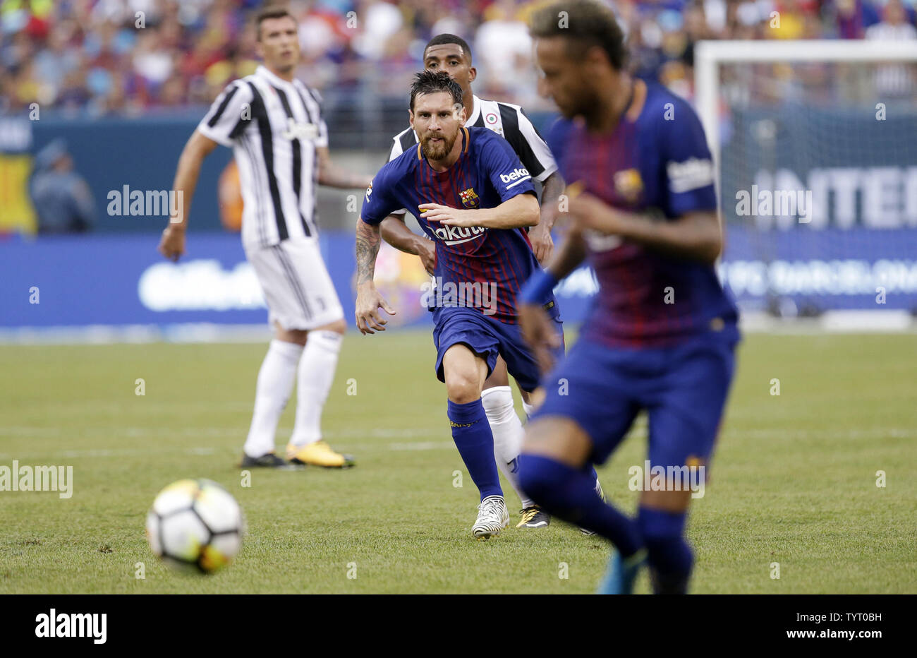 Lionel Messi of Barcelona runs to the ball in the first half against ...