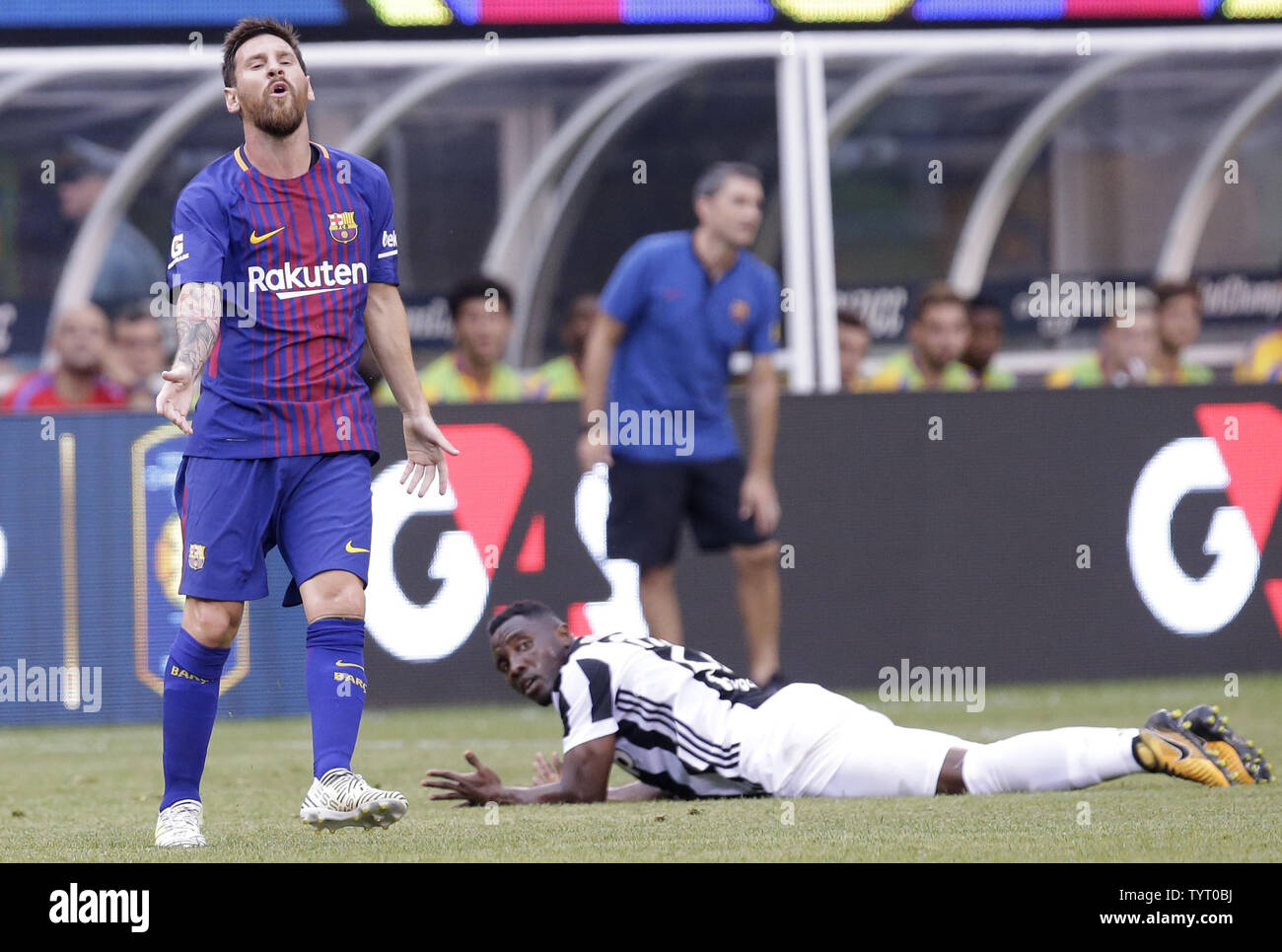 Lionel Messi of Barcelona reacts after a kick in the first half against ...