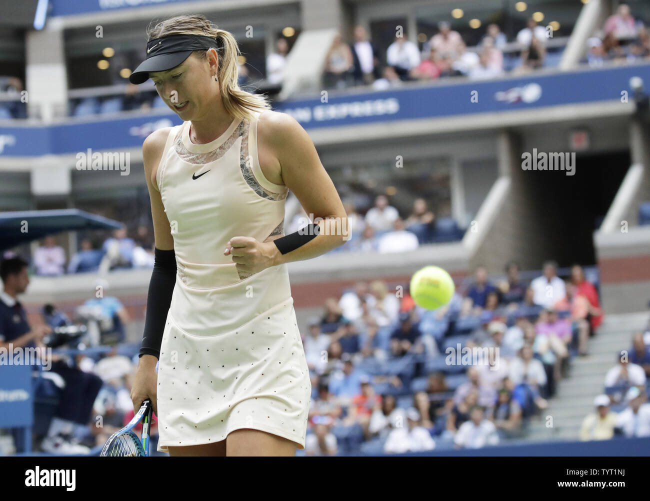 Maria Sharapova of Russia pumps her fist after winning a point in her 2nd round match against ...