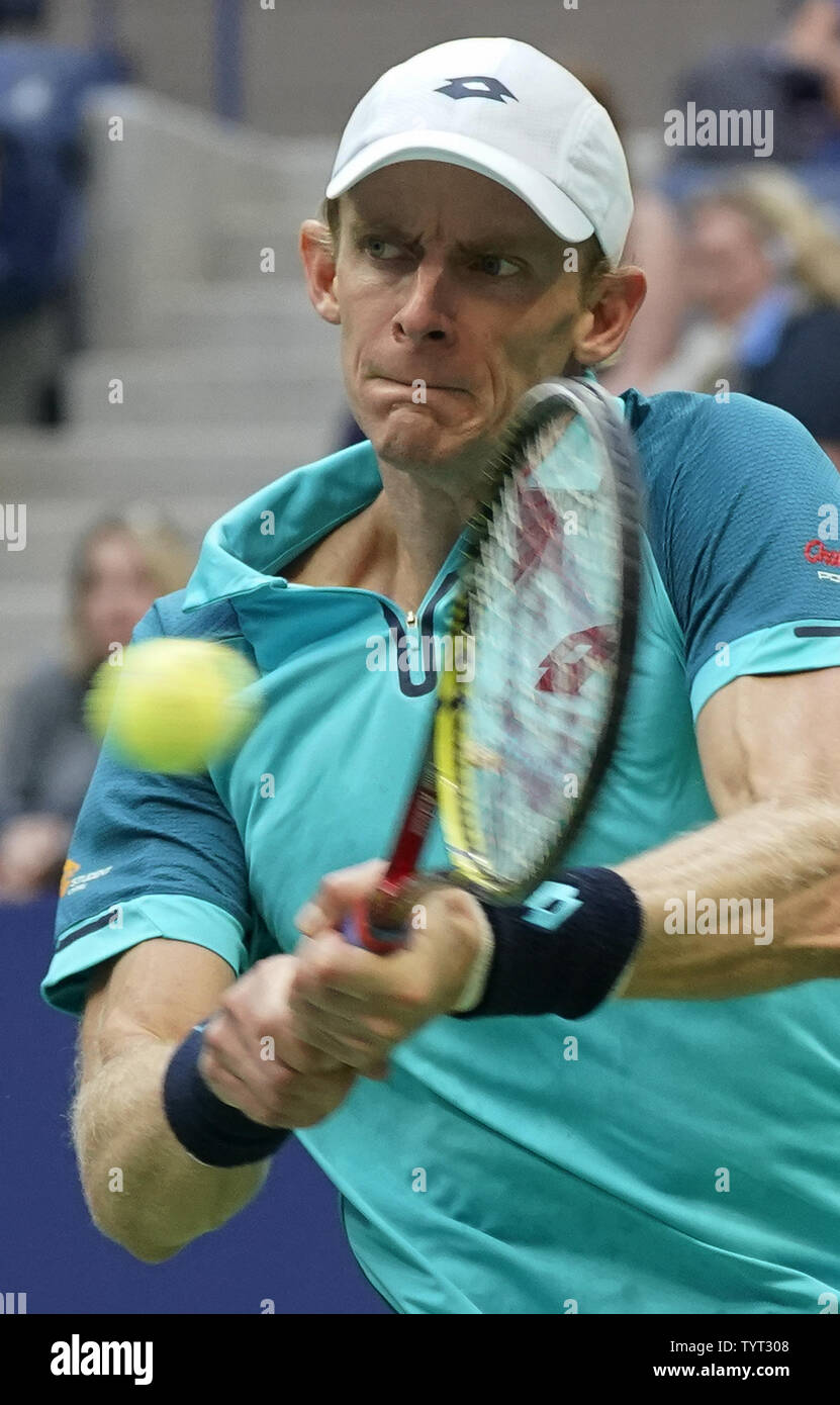 Kevin Anderson of South Africa returns a shot from Kevin Anderson of ...