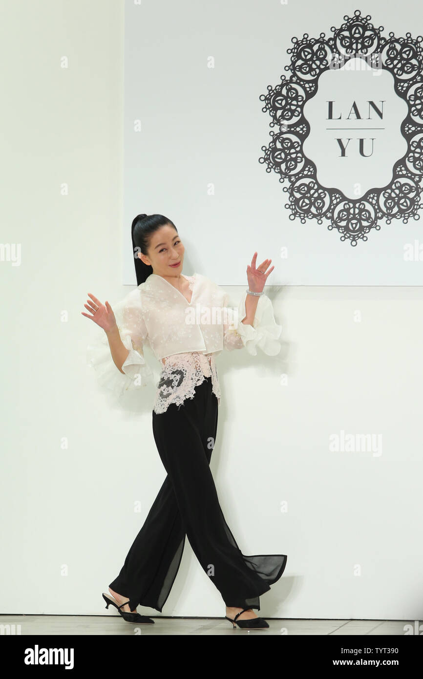 Designer Lan Yu walks on the runway at the Lanyu fashion show during ...