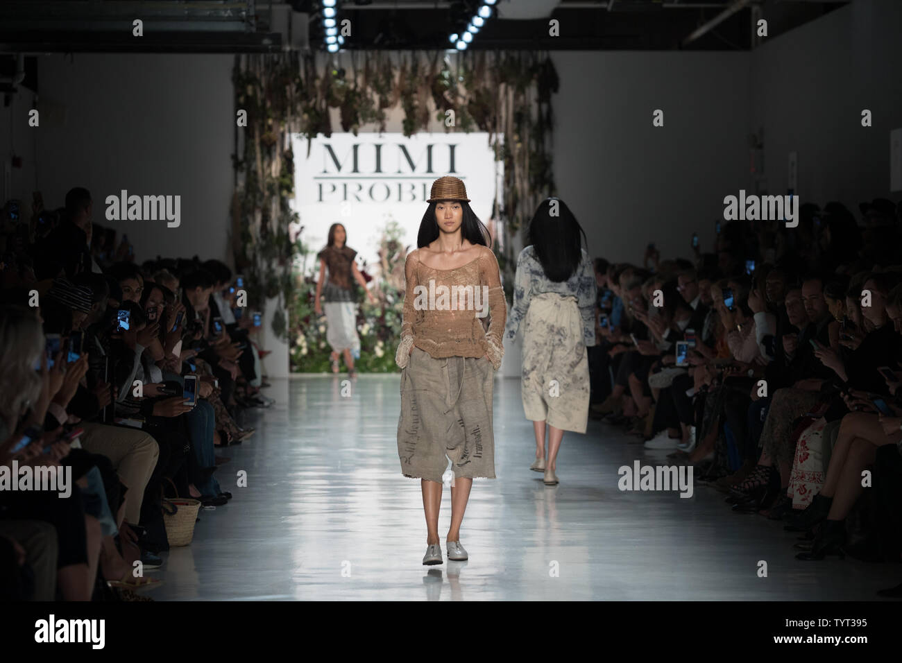 A model walks on the runway at the Mimi Prober fashion show during New ...