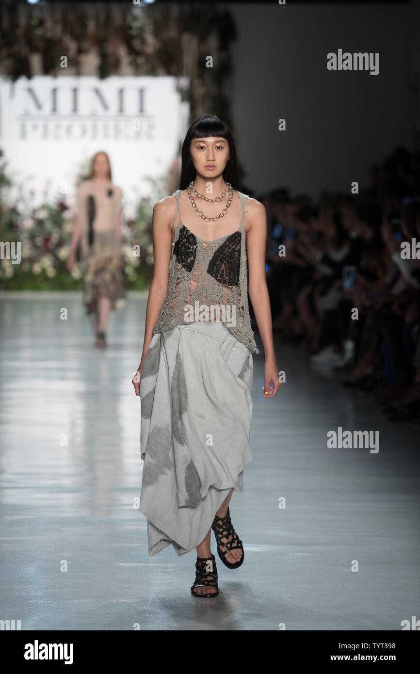 A model walks on the runway at the Mimi Prober fashion show during New ...