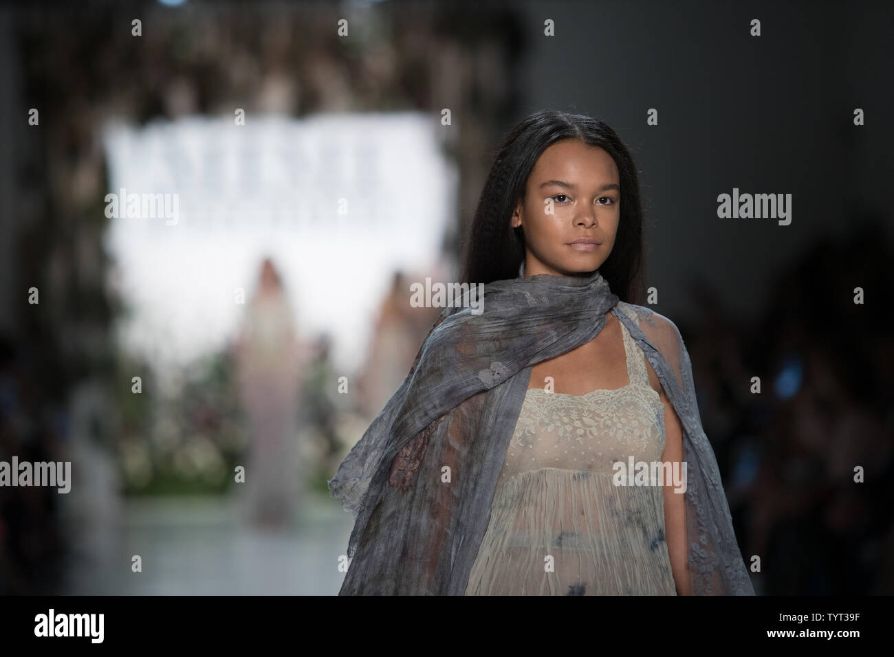 A model walks on the runway at the Mimi Prober fashion show during New ...