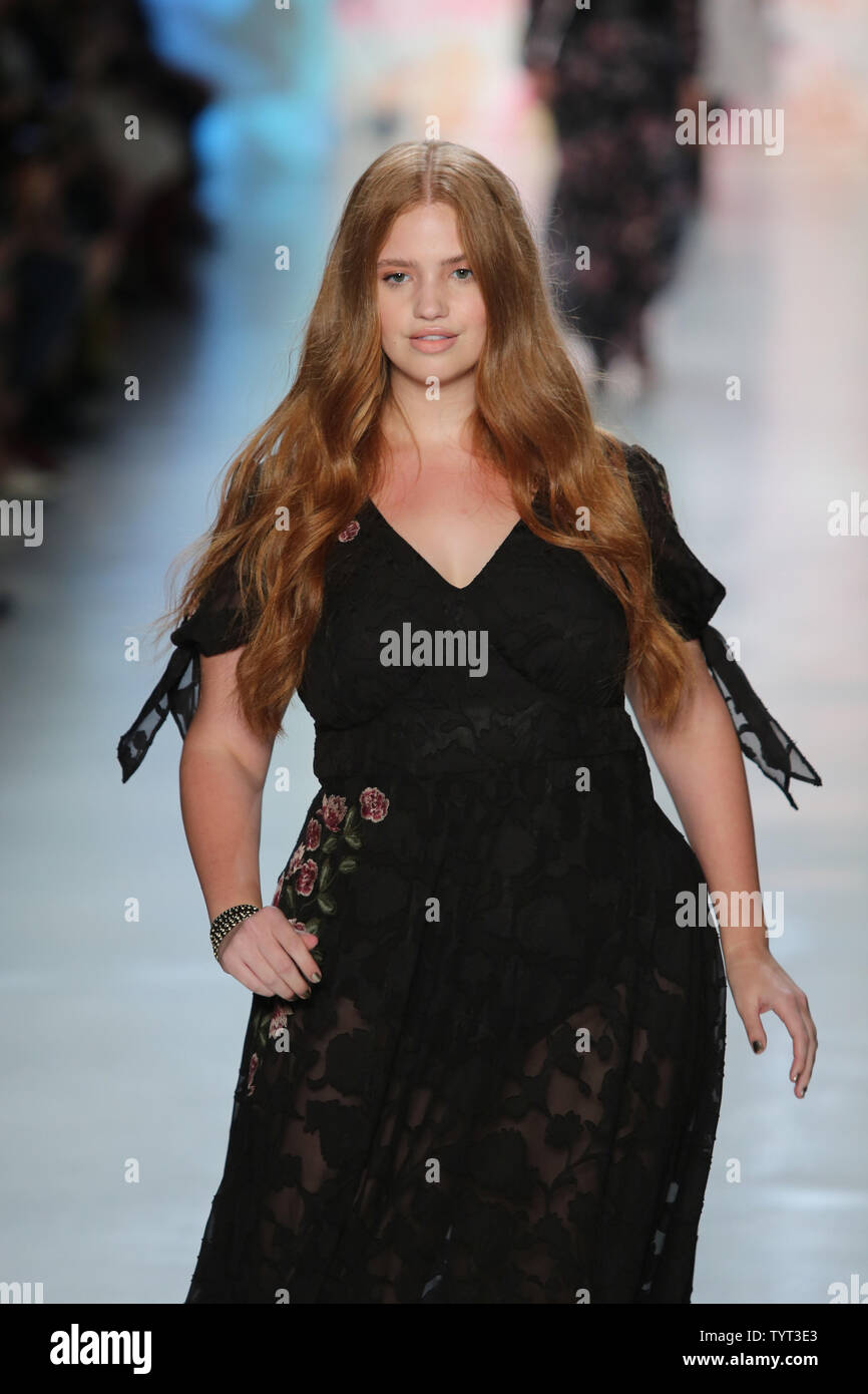 A model walks on the runway at the TORRID fashion show during New York ...