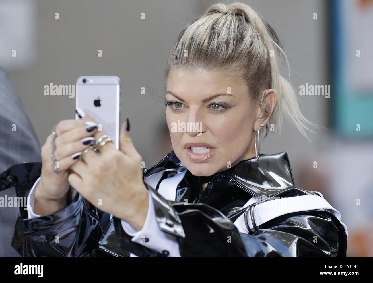 Fergie takes a selfie when she performs on the NBC Today Show at ...
