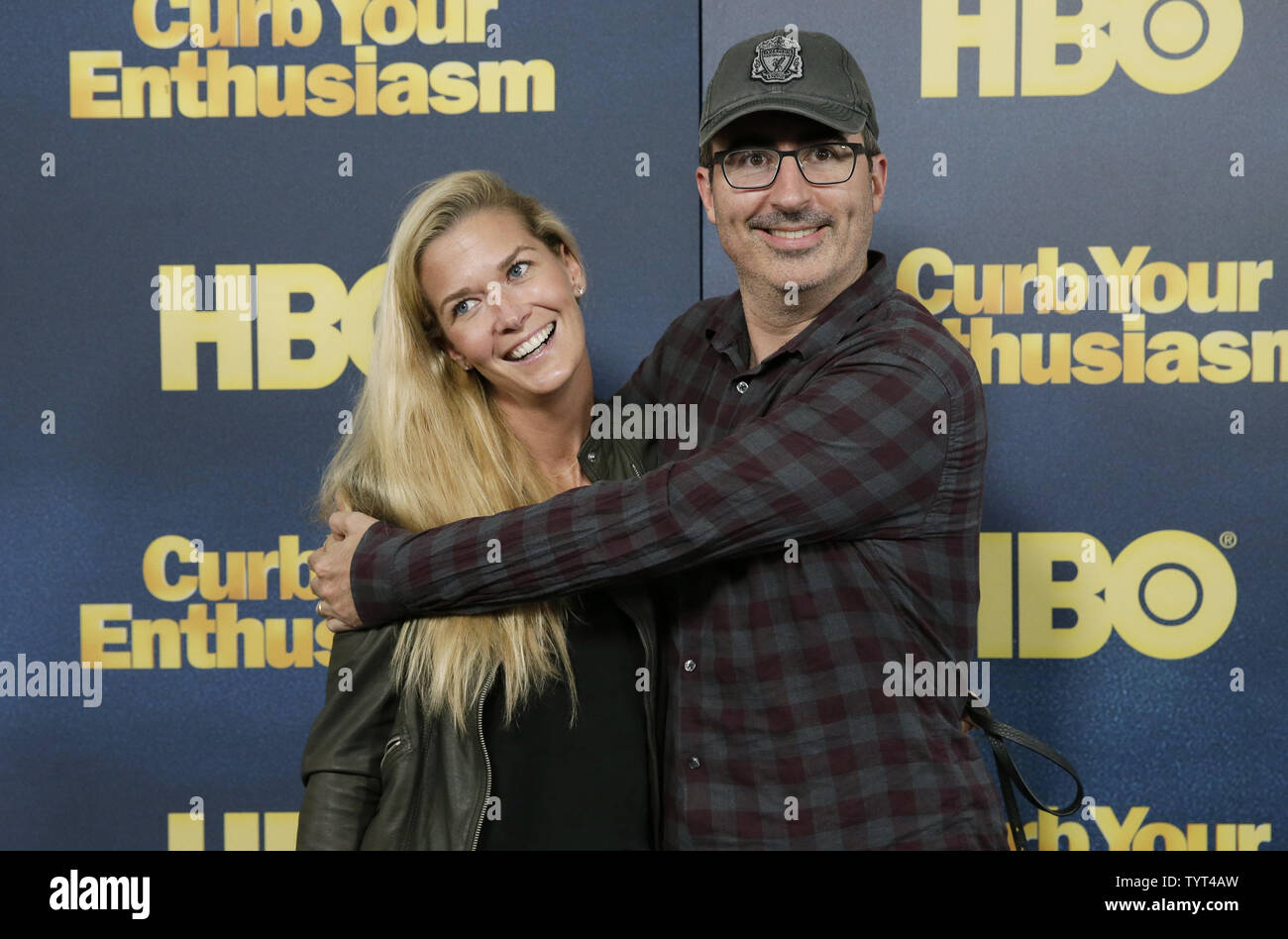Kate Norley and John Oliver arrive on the red carpet at the 'Curb Your ...