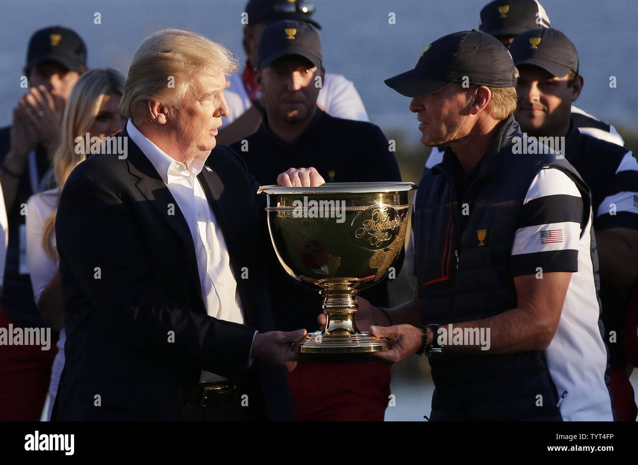 United States President Donald Trump hands Captain of the United States ...