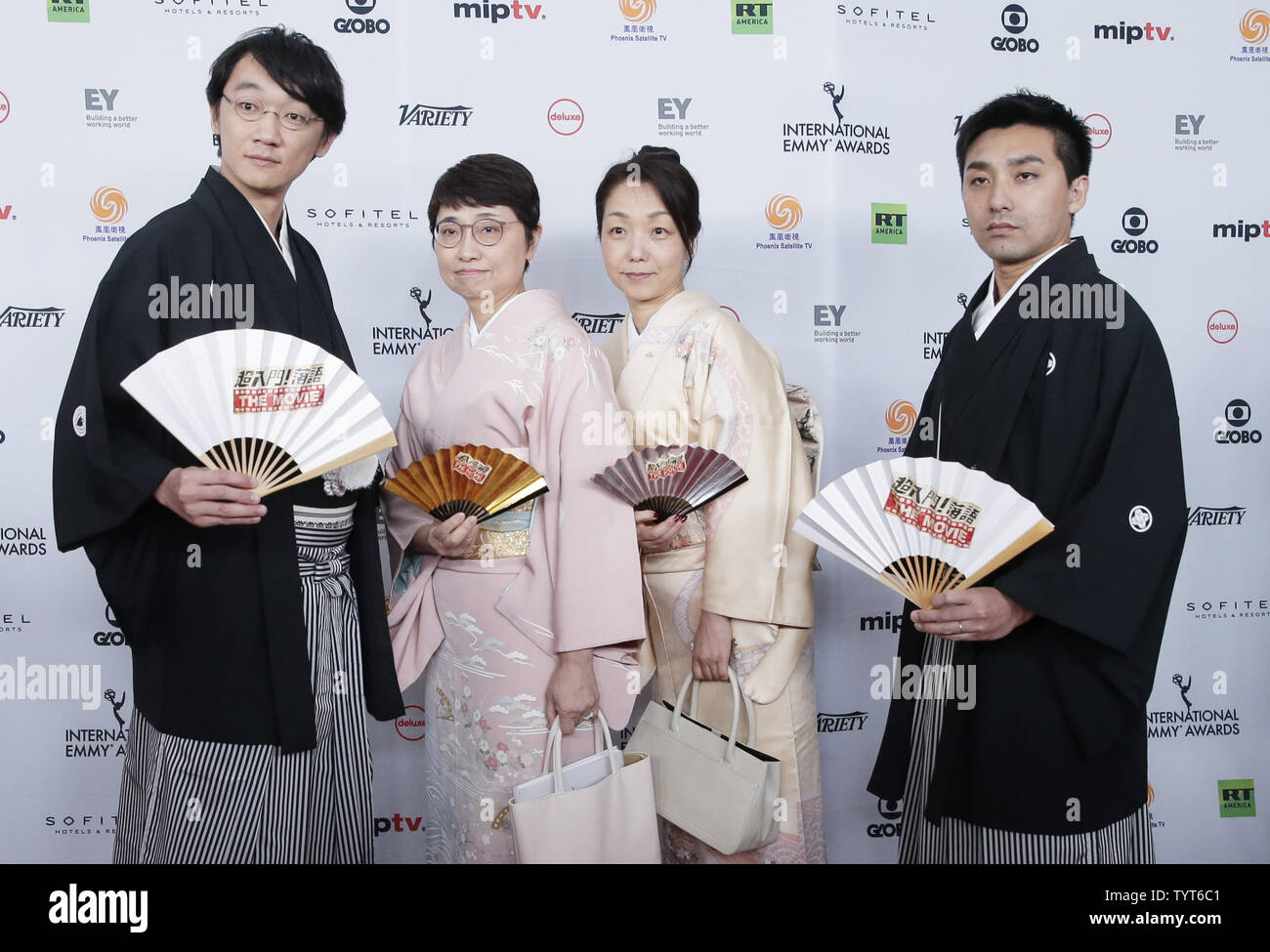 Kazuyo Sezaki and Masato Sakai arrive on the red carpet at the 45th ...