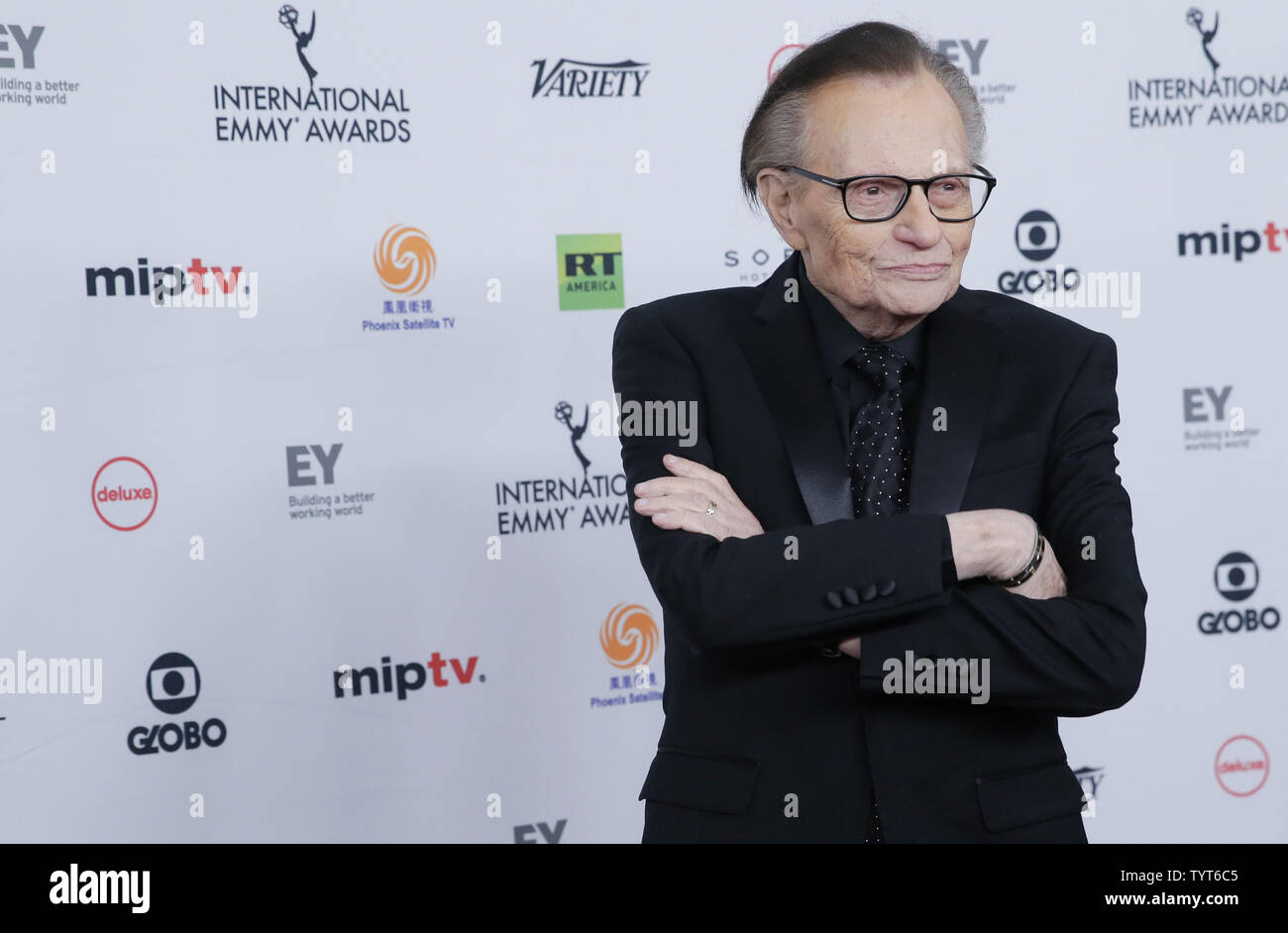 Larry King arrives on the red carpet at the 45th International Emmy ...