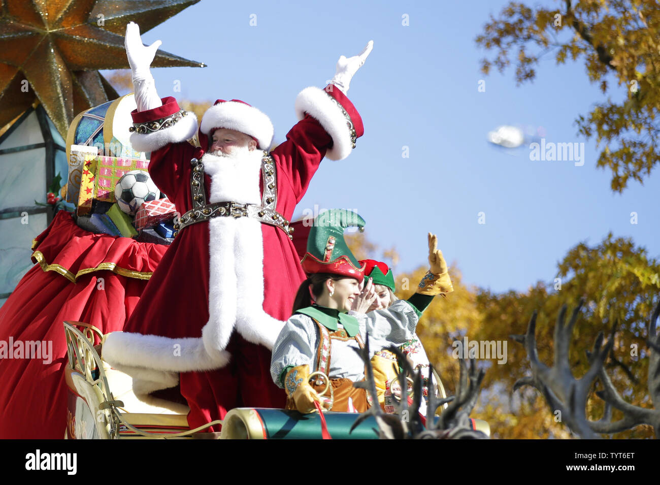 Santa Clause moves down the parade route at the 91st Macy's ...