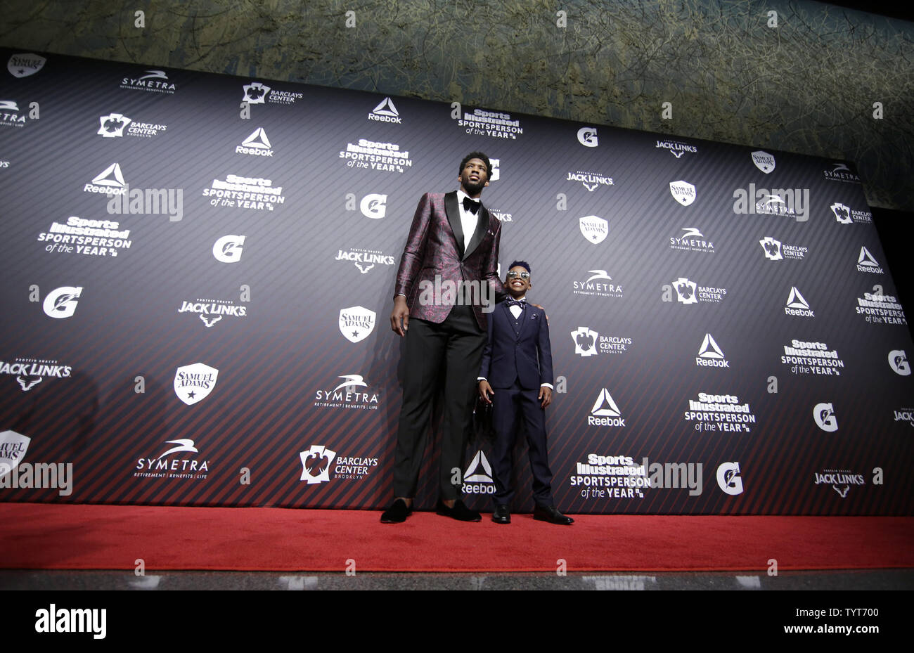 Joel Embiid and Maxwell 'Bunchie' Young arrive on the red carpet at the ...