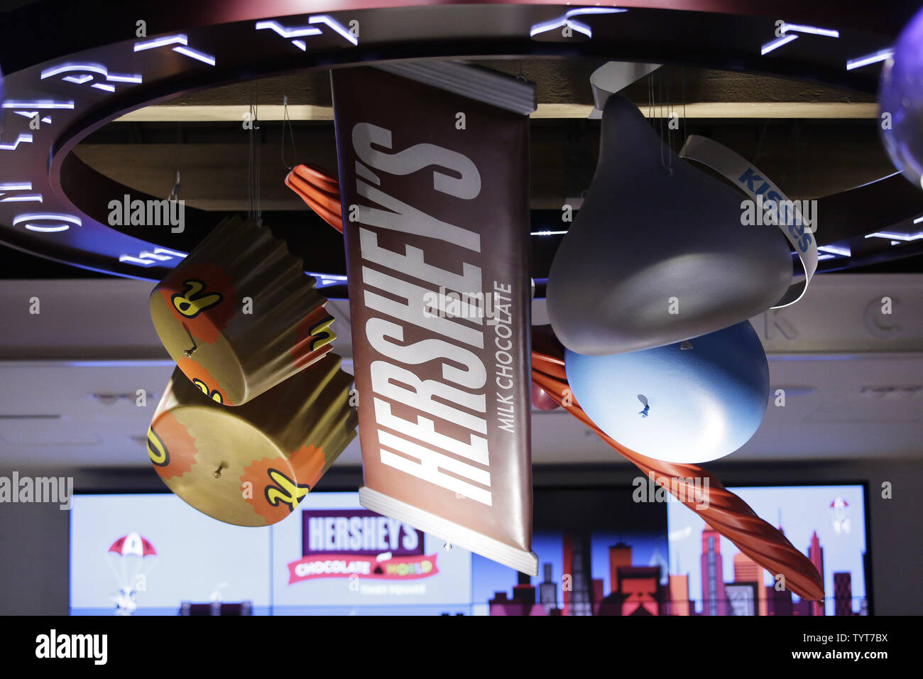 Hershey's products are on display as shoppers walk through a new ...