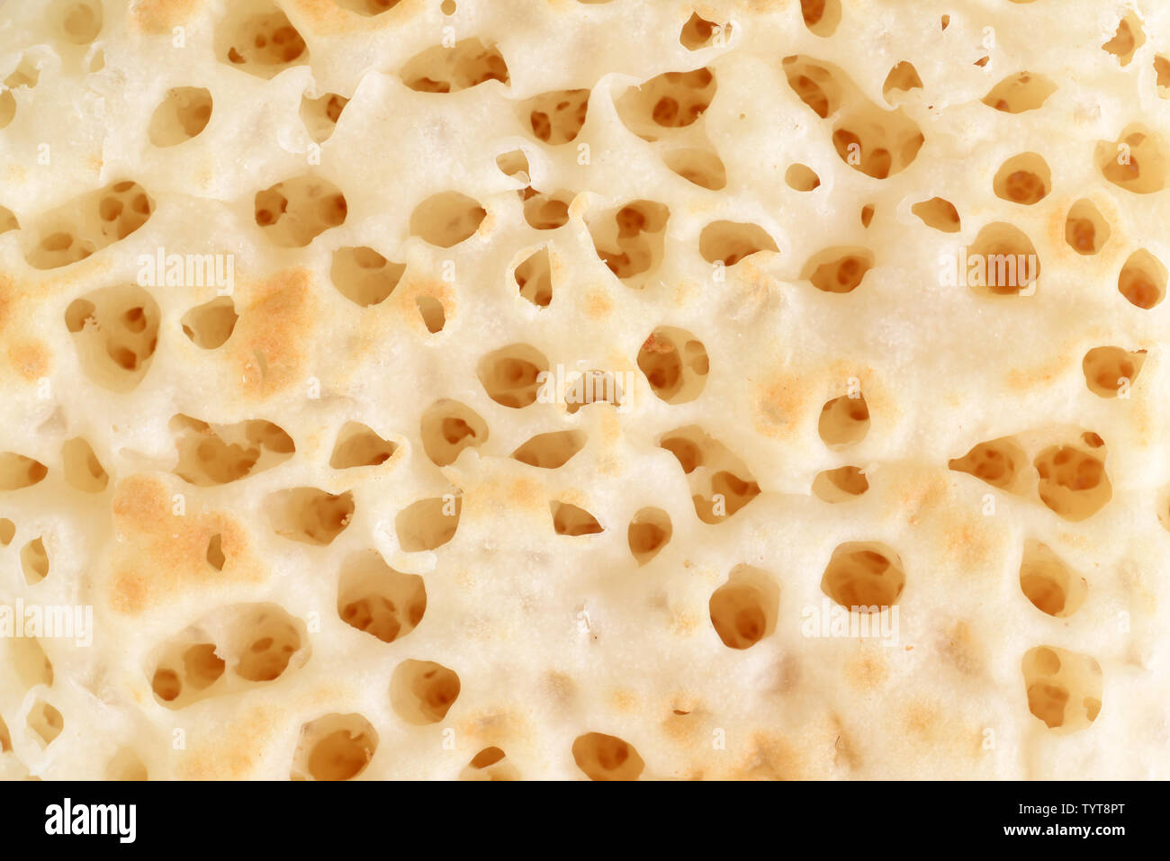 macro english crumpet background Stock Photo - Alamy