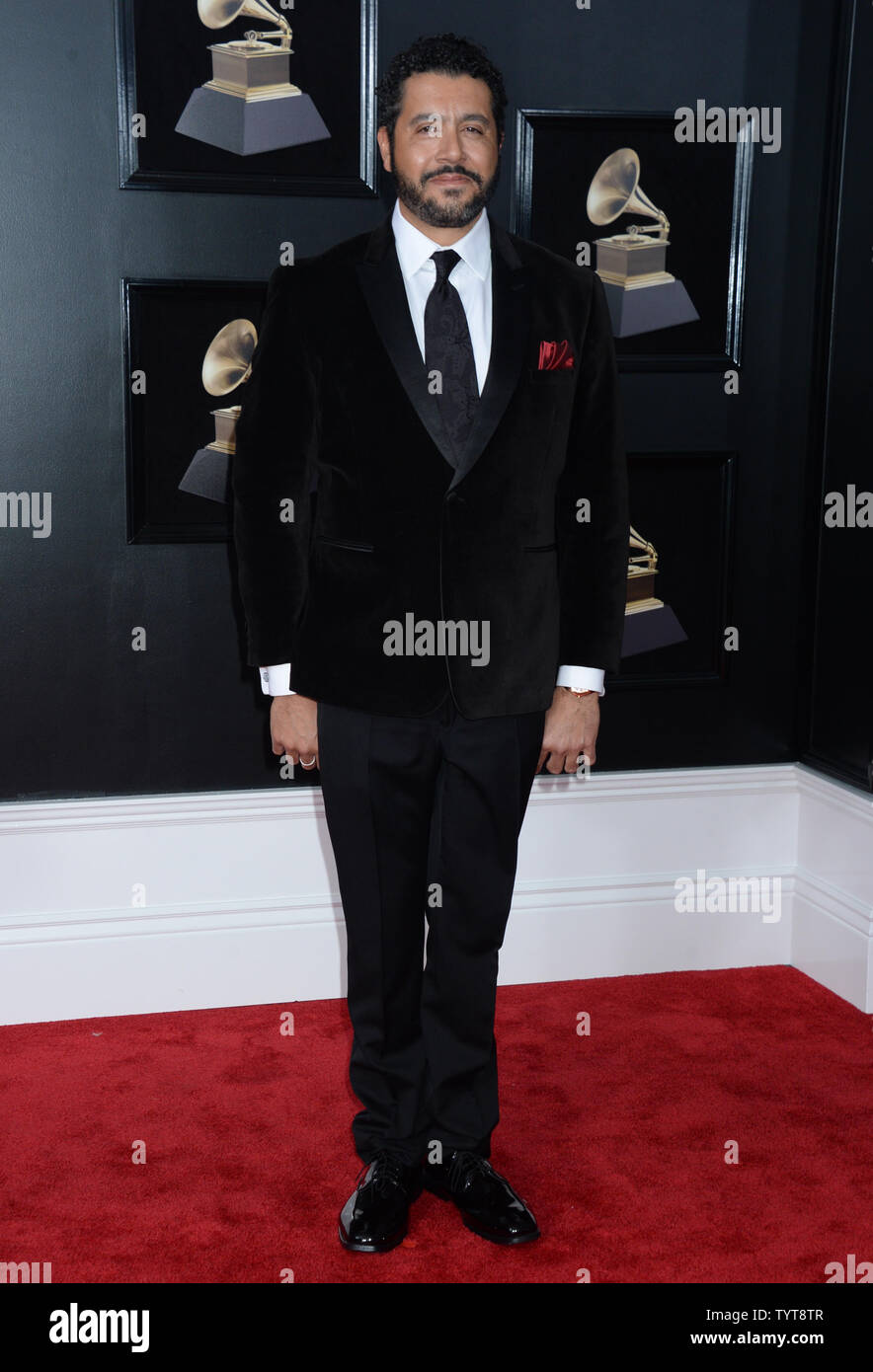Doug Beavers arrives on the red carpet at the 60th Annual Grammy Awards ...
