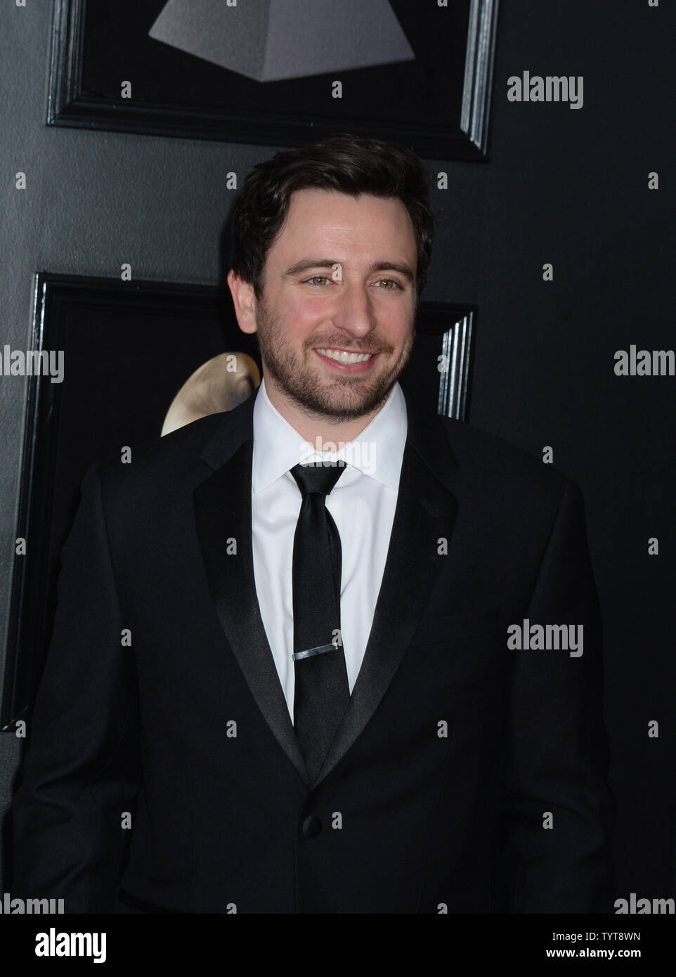 Recording artist Jonathan Smith arrives on the red carpet at the 60th ...