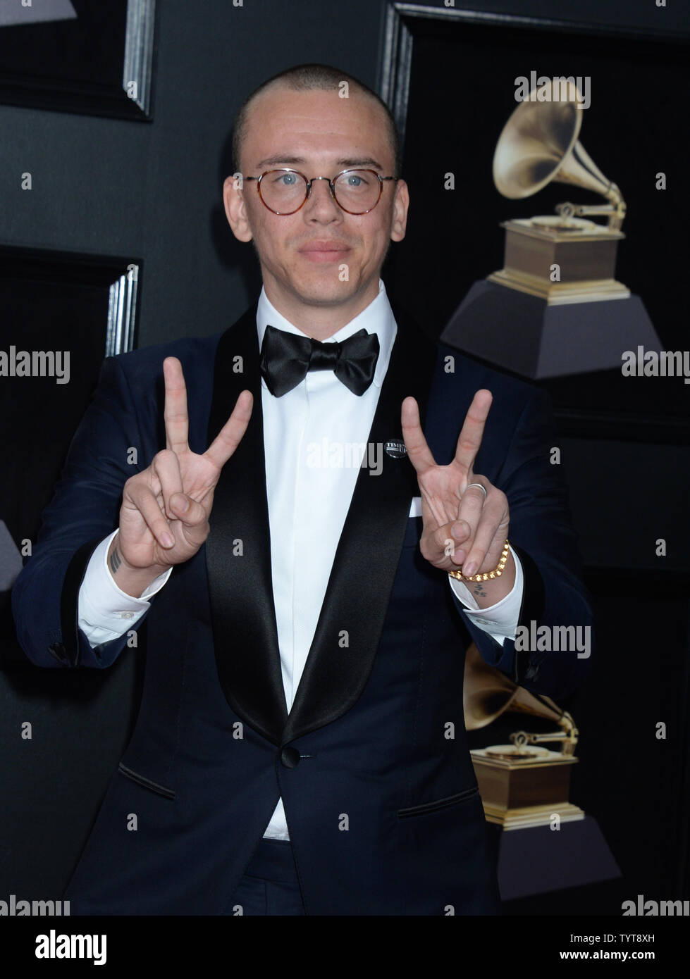 Logic arrives on the red carpet at the 60th Annual Grammy Awards ...