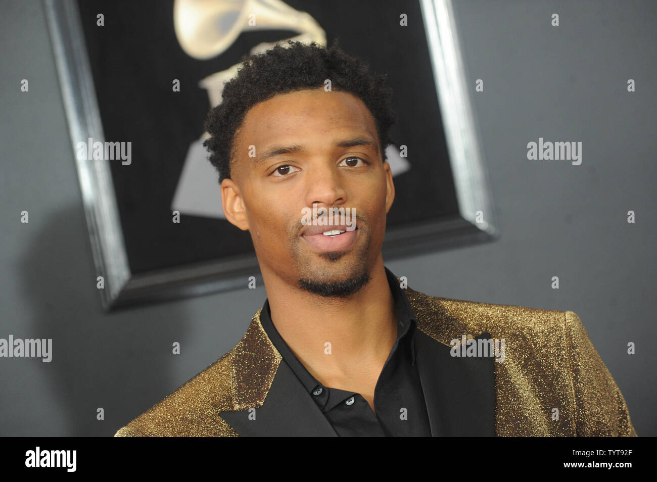 Recording artist Tyran Brown arrives on the red carpet at the 60th ...