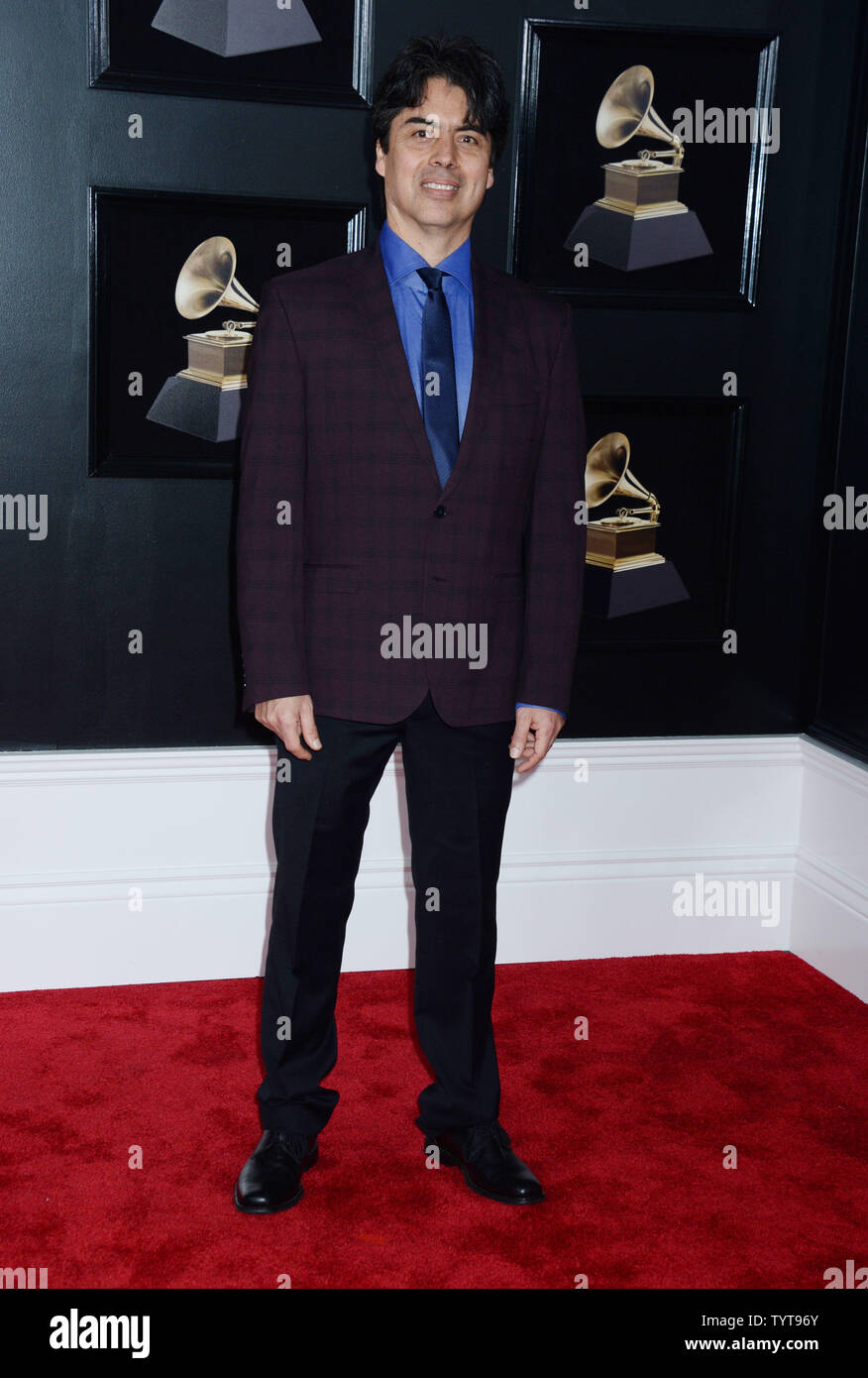 Randy Porter arrives on the red carpet at the 60th Annual Grammy Awards ...