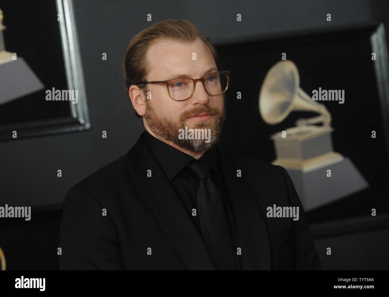 Andy Hines arrives on the red carpet at the 60th Annual Grammy Awards ...