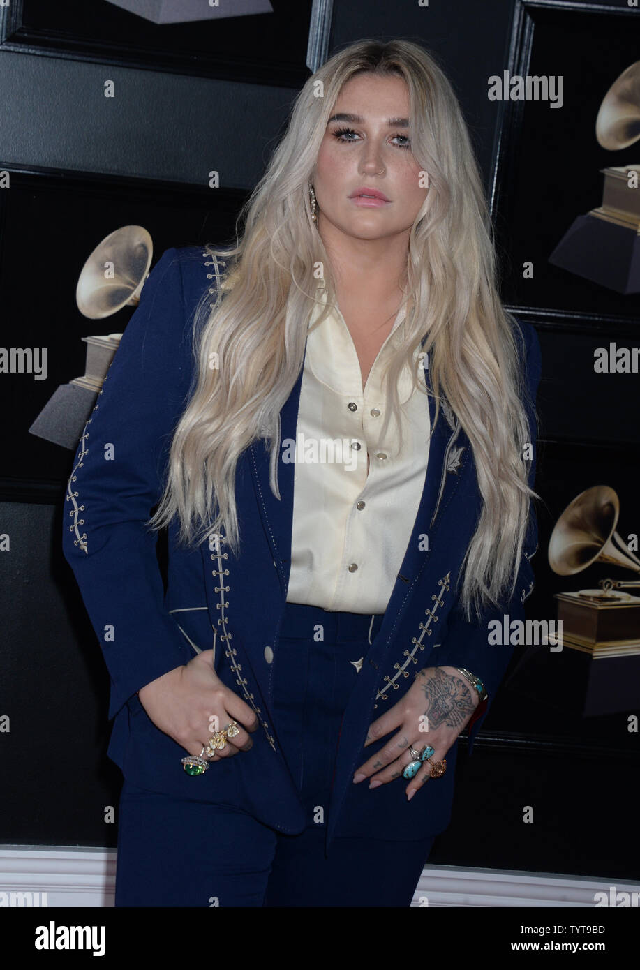 Kesha arrives on the red carpet at the 60th Annual Grammy Awards ...