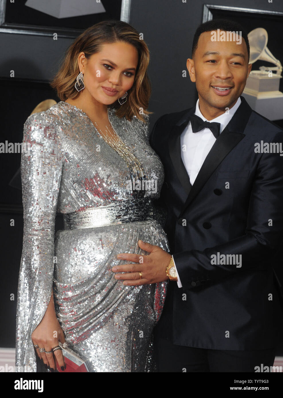Chrissy Teigen and John Legend arrive on the red carpet at the 60th ...