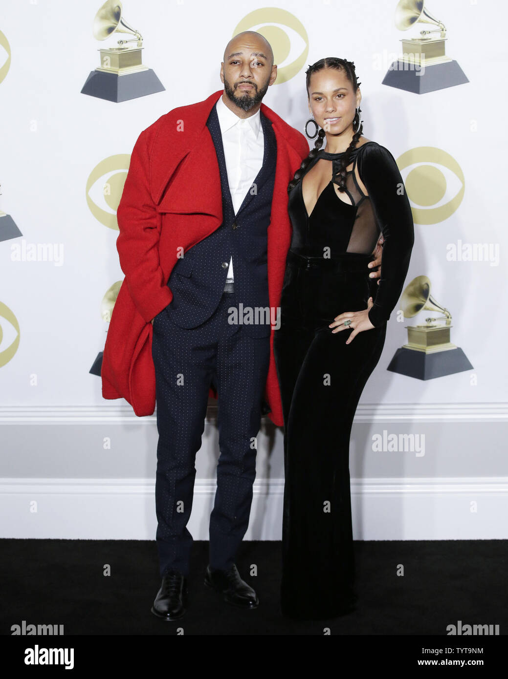 Swizz Beatz and Alicia Keys arrive in the press room at the 60th Annual ...