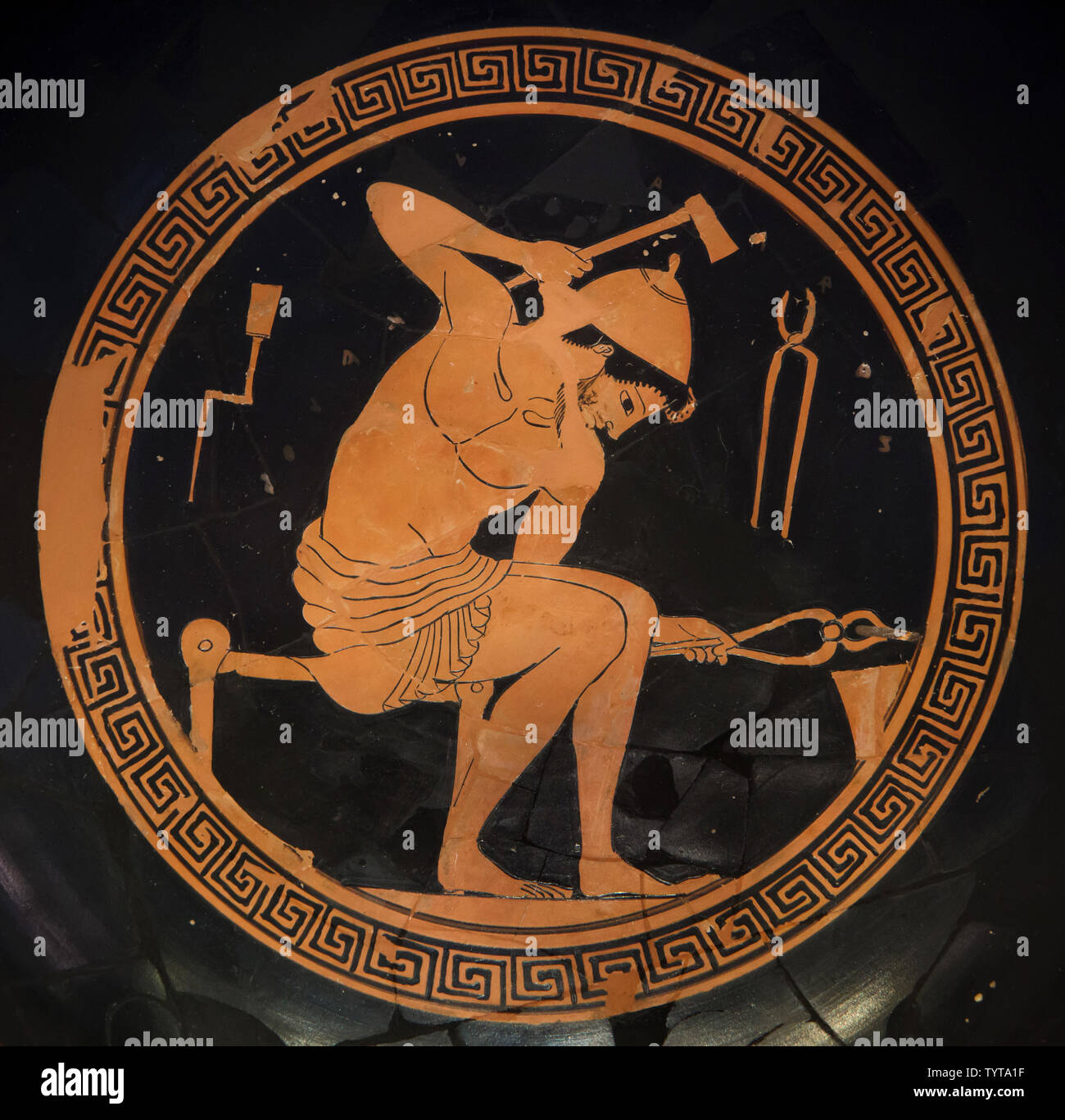 Blacksmith hammering depicted in the Attic red-figure drinking cup ...