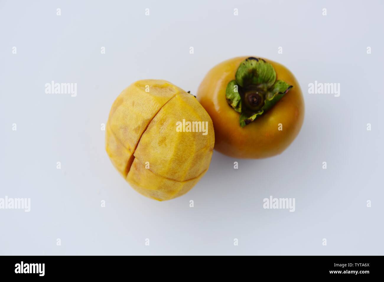 Persimmon white bottom picture hi-res stock photography and images - Alamy
