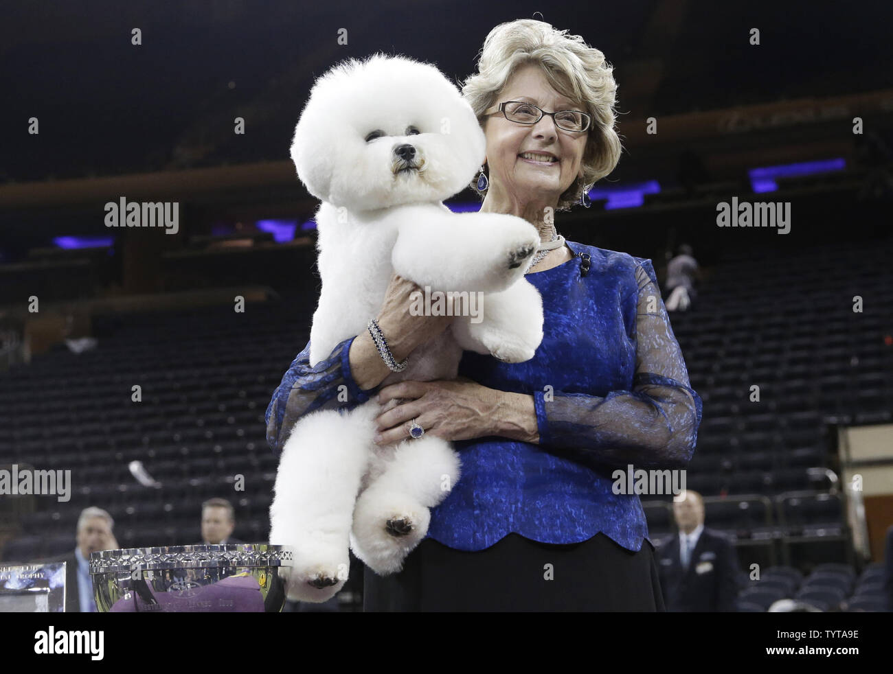 Best in Show Judge Betty Anne Stenmark holds Flynn the Bichon Frise ...
